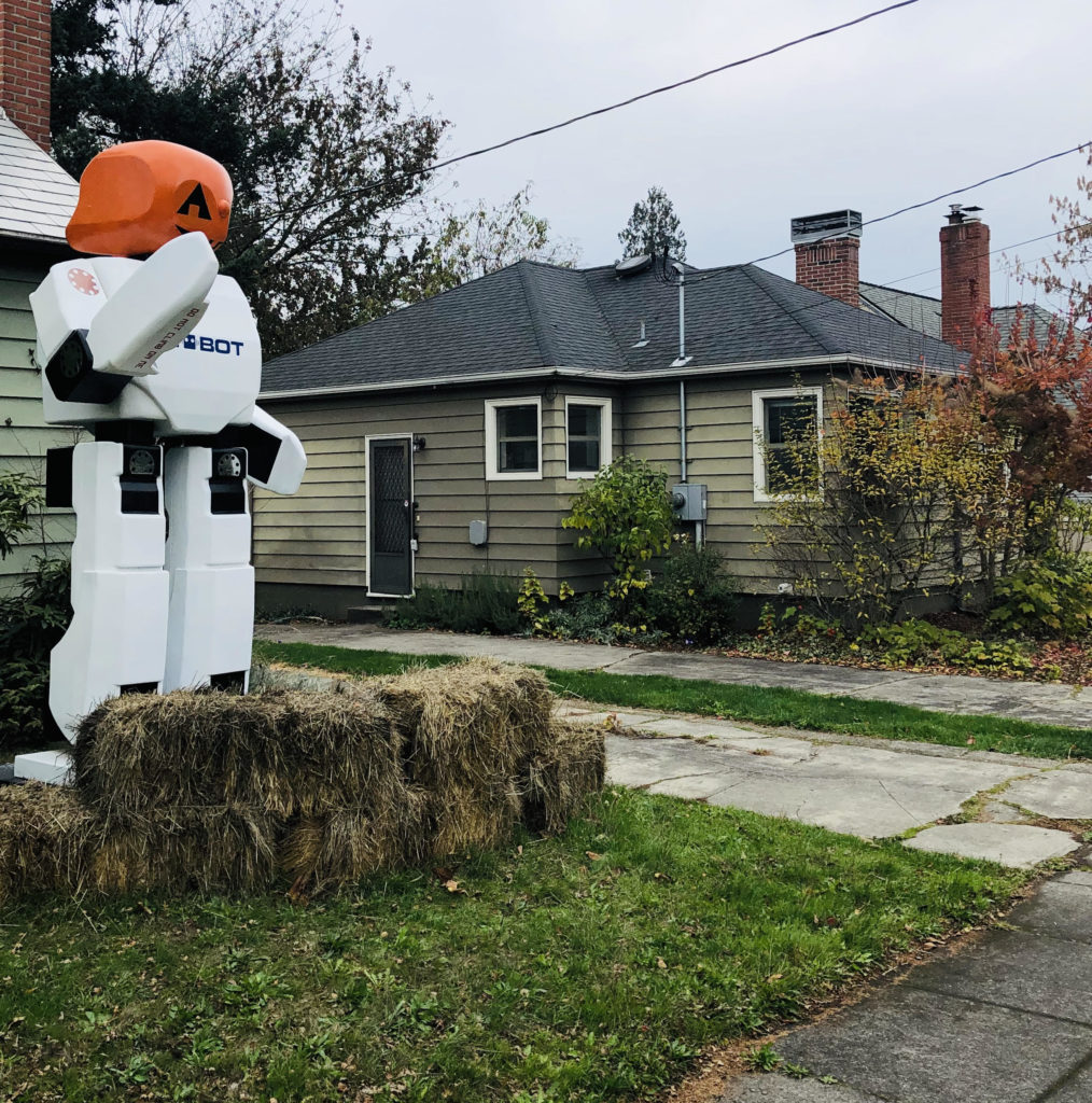 10 Foot Tall Pumpkin Headed Robot Neighbor! - Living Room Realty