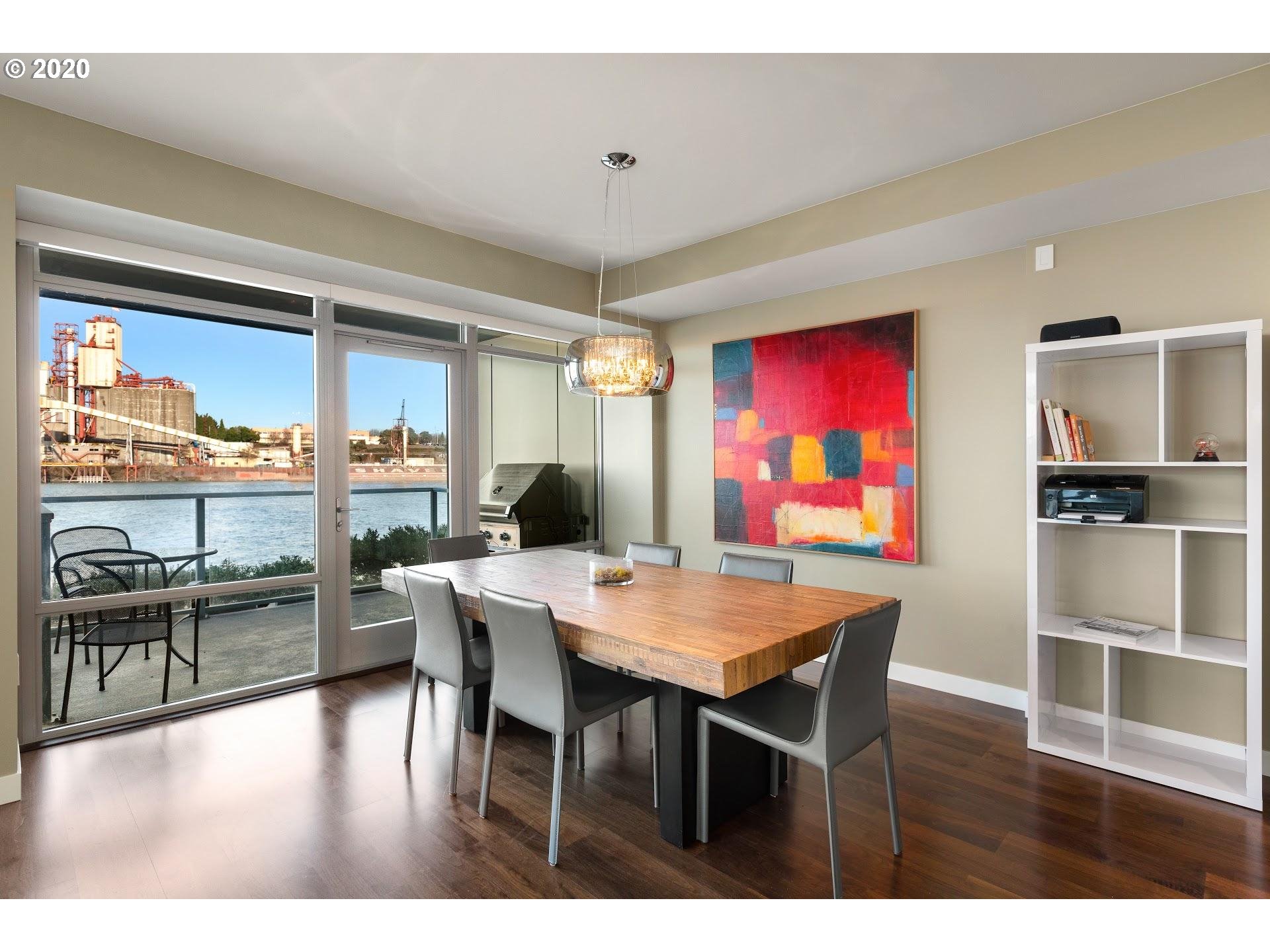 JUST SOLD! Stunning Waterfront Pearl Condo - Living Room Realty